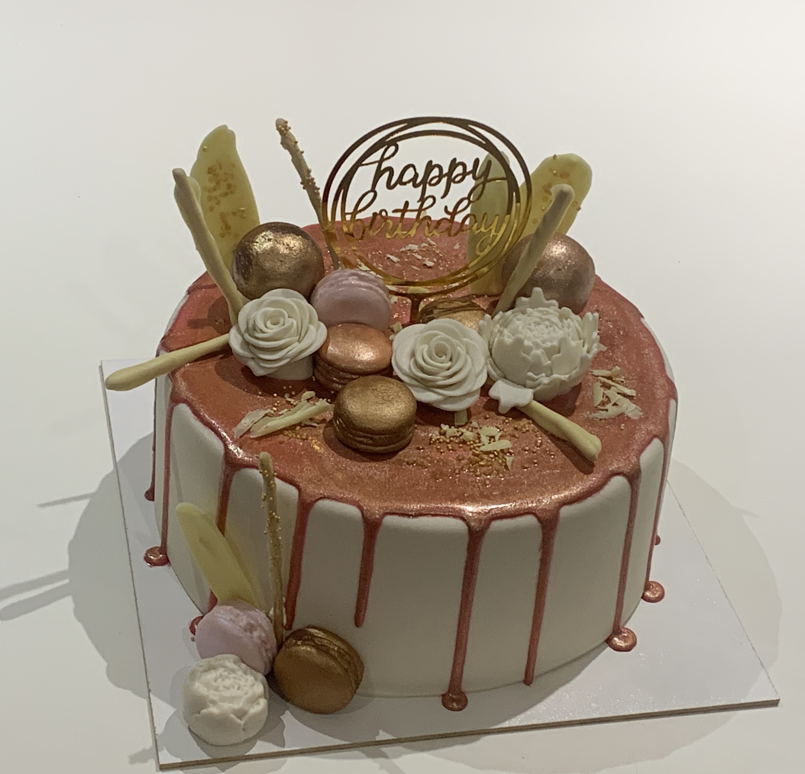 Rosé gold drip taart - Het Taartenhuis